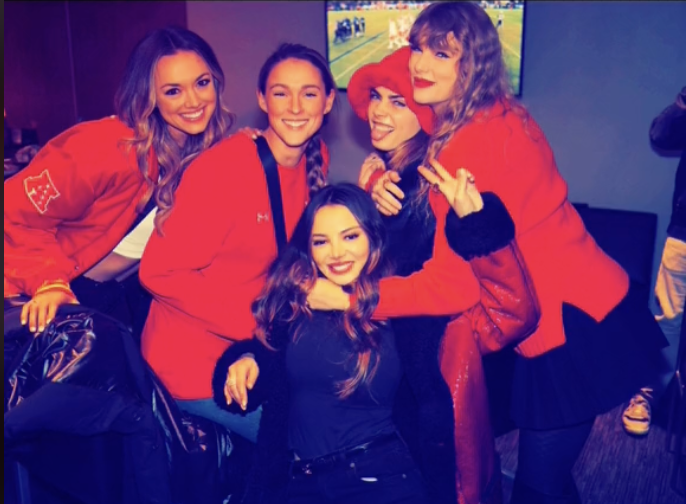 Taylor Swift Hugs Travis’ Friends, Family in Keleigh’s Video | Life & Style